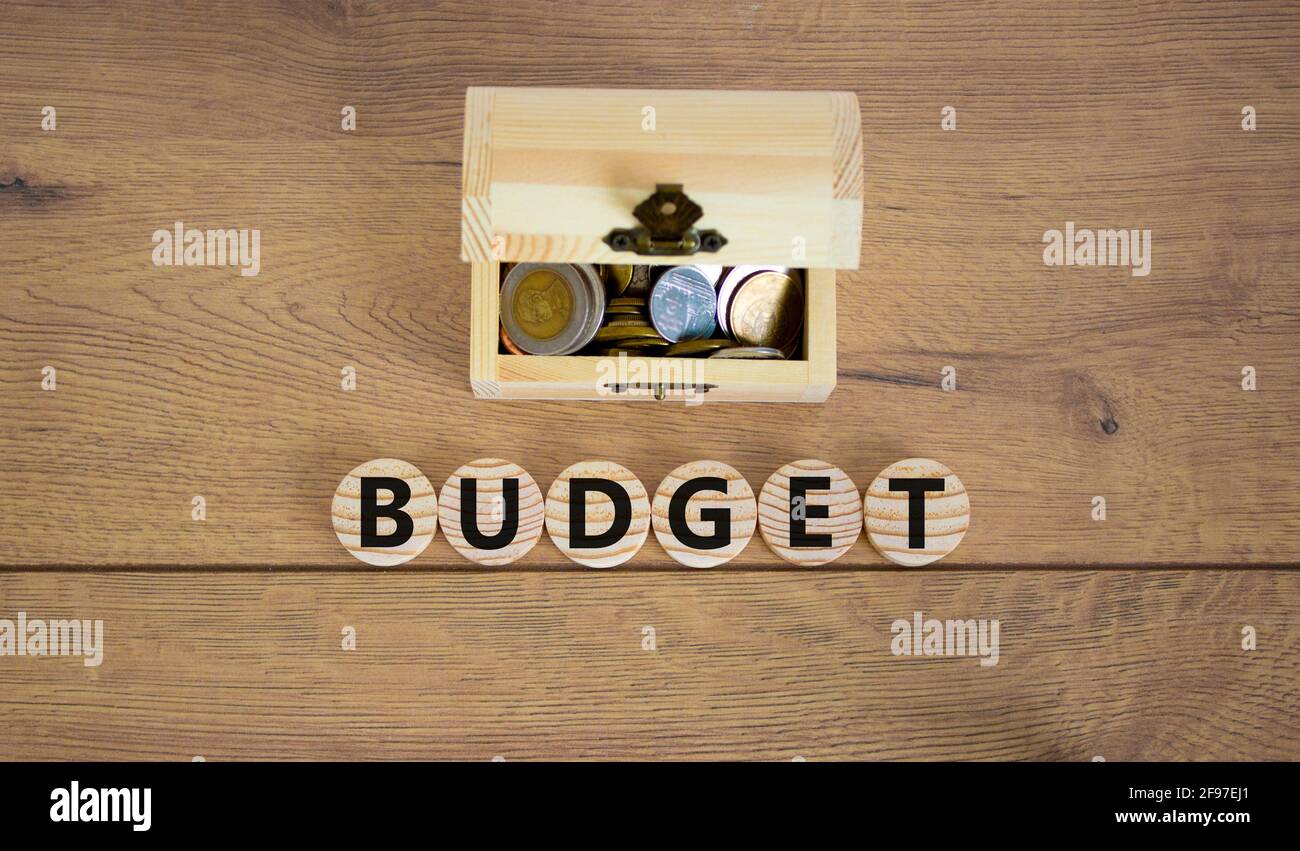 Budget symbol. Concept word budget on wooden cubes on a beautiful ...