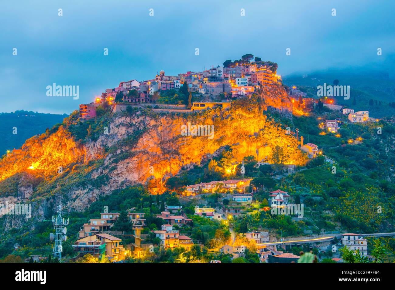 Sunset view of Castelmola village, Sicily, Italy Stock Photo - Alamy