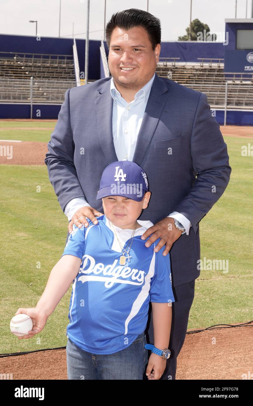 City of Compton councilman Isaac Galvan poses with son at Los Angeles ...
