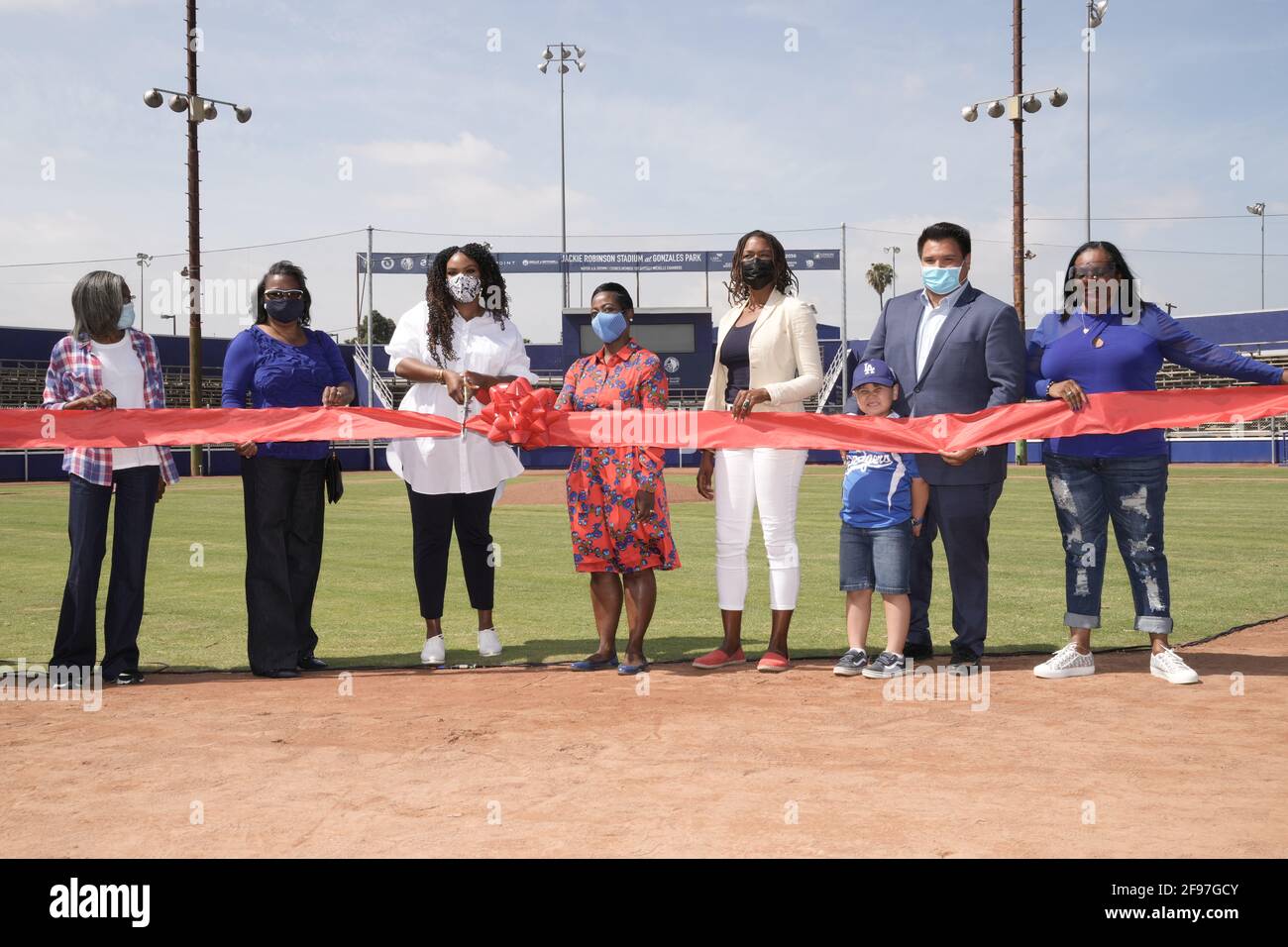 City of Compton mayor Aja Brown third from (left), Los Angeles Dodgers ...