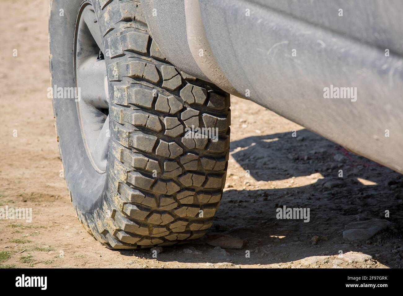 muddy off-road tire with rough tread for 4x4 four-wheel drive cars on ...