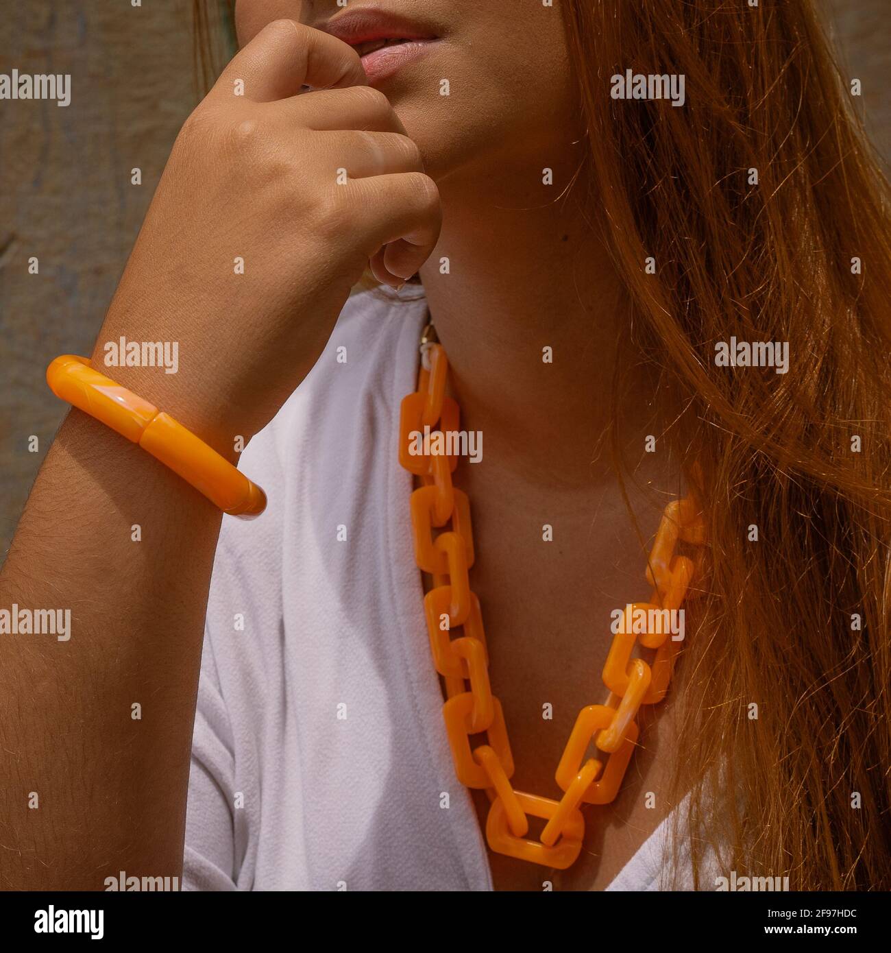 red haired model strike a pose for jewelry Stock Photo - Alamy