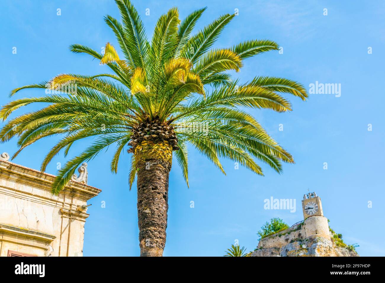 View of a famous clock tower in the Conti castle in Modica, Sicily ...