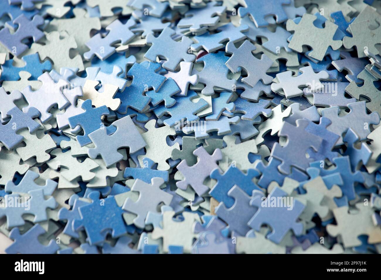 Jigsaw puzzle pieces fall in hi-res stock photography and images - Alamy