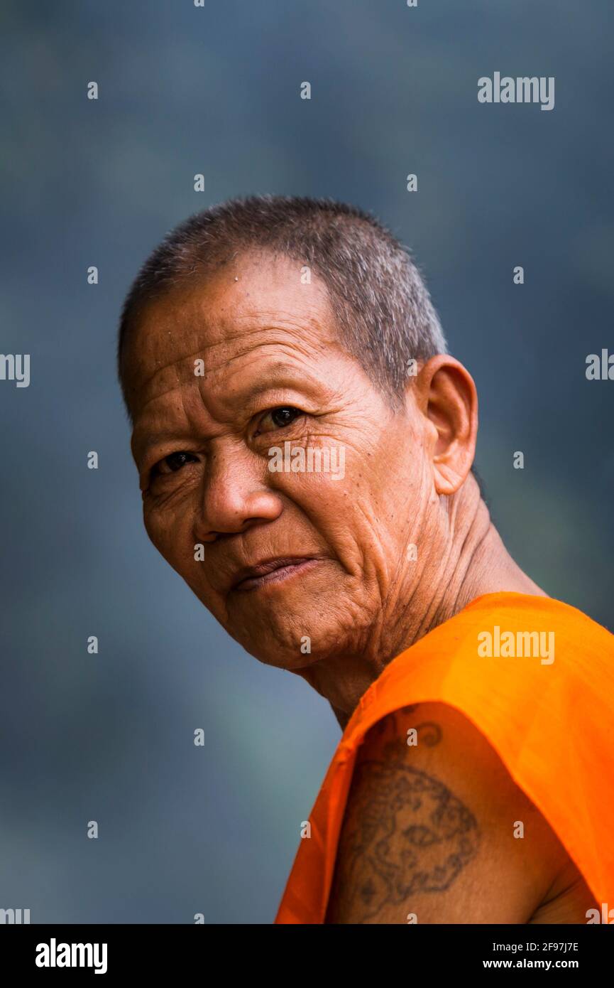 Laos, Luang Prabang, the temple Vat Xieng Mene Saiyasettharam, monk ...