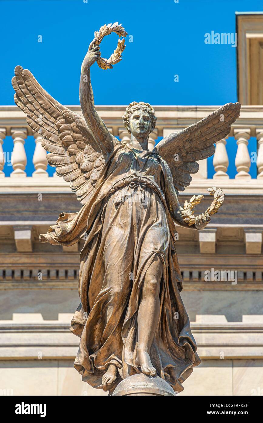 Statue of beautiful angel with wings at sunset colors in Prague ...
