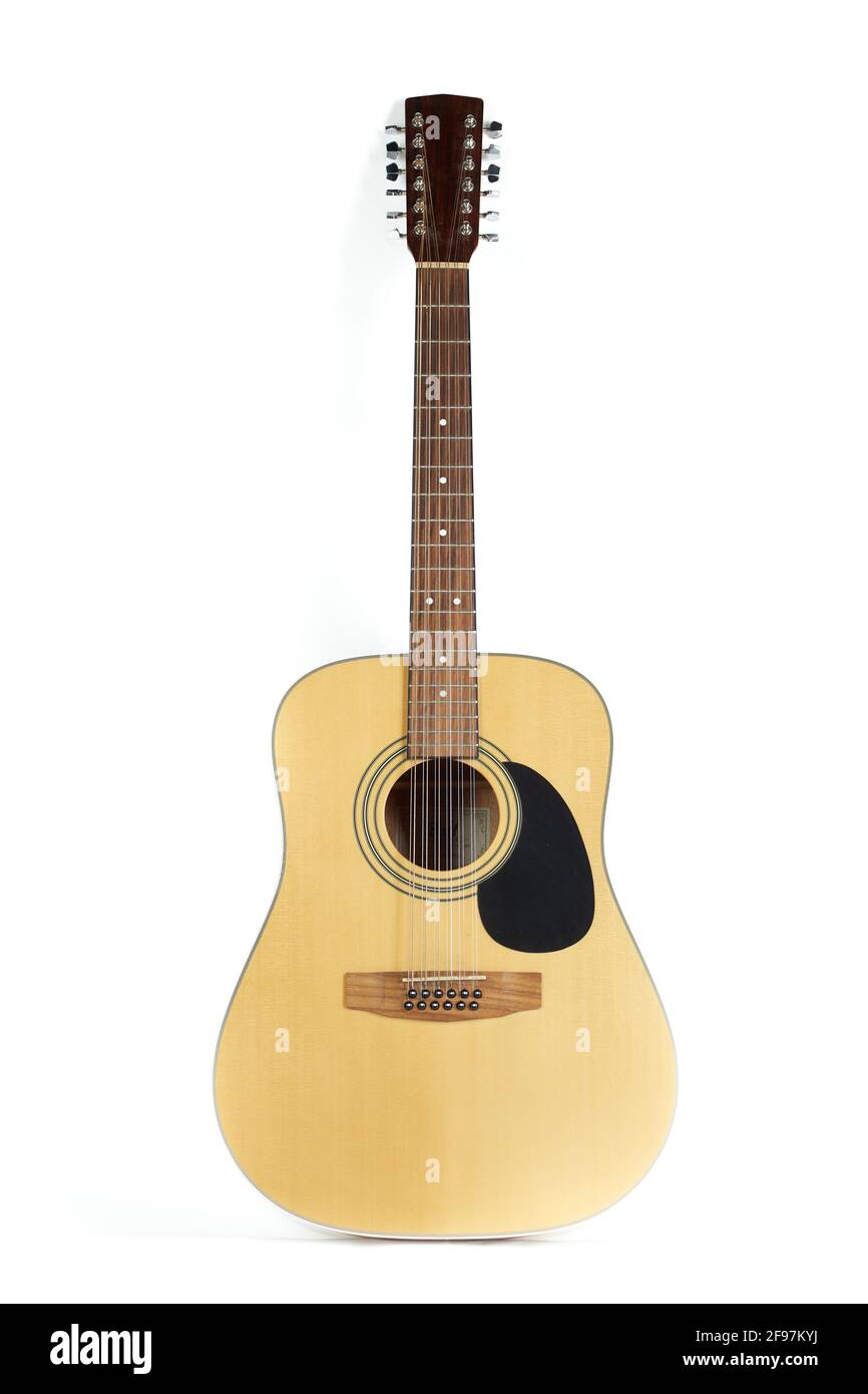 Acoustic twelve-string guitar isolated on white background Stock Photo ...