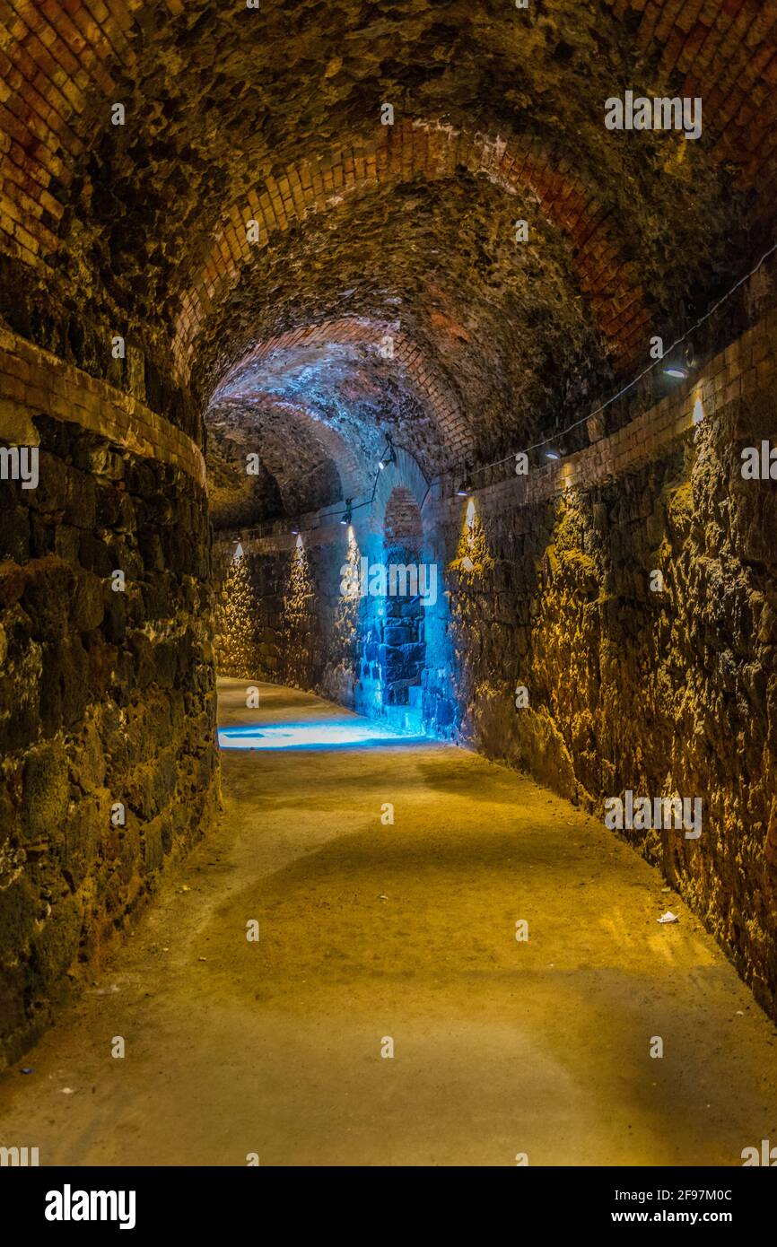 An inner passage inside of the ancient roman theatre in Catania, Sicily ...