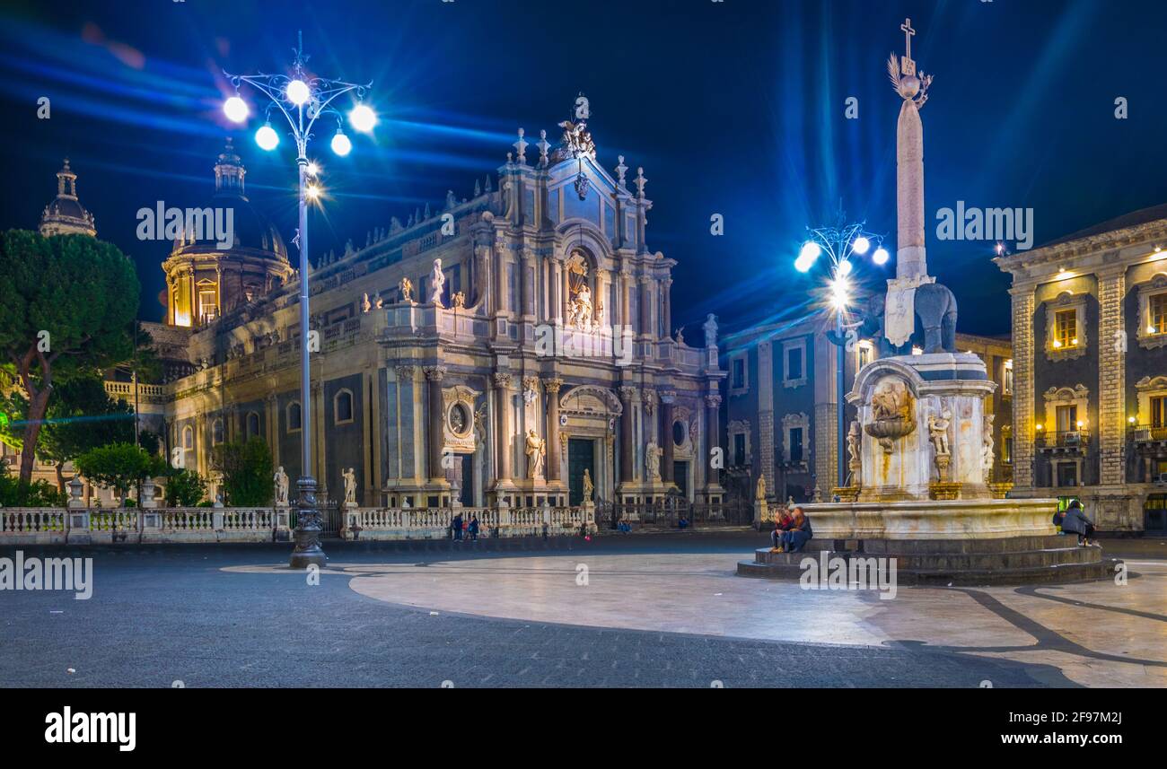 Night view of the cathedral of saint agatha and badia Agatha church in ...