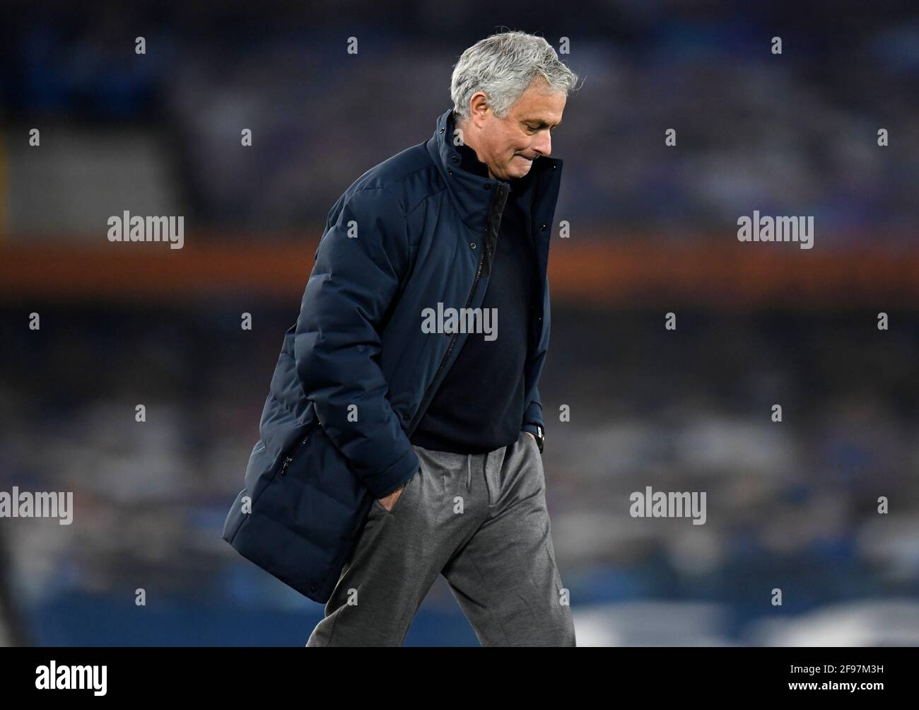 Tottenham Hotspur manager Jose Mourinho walks across the pitch after ...