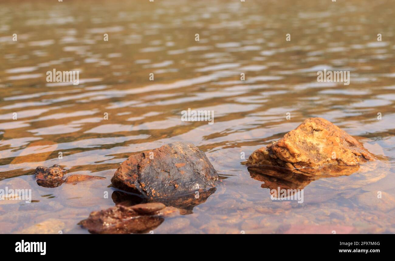 Close view shallow water rocks hi-res stock photography and images - Alamy