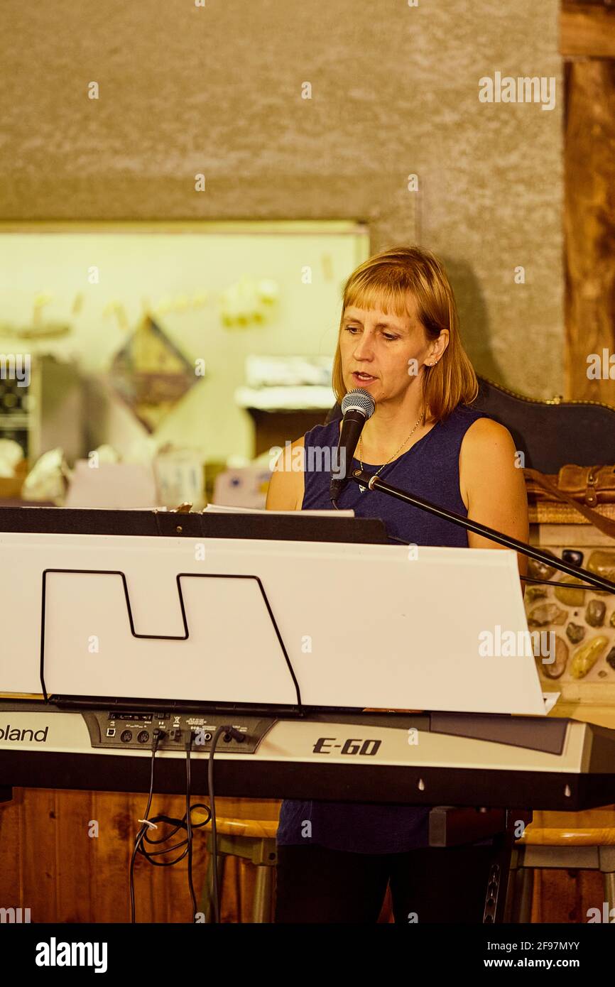 Song leaders at a family event Stock Photo - Alamy