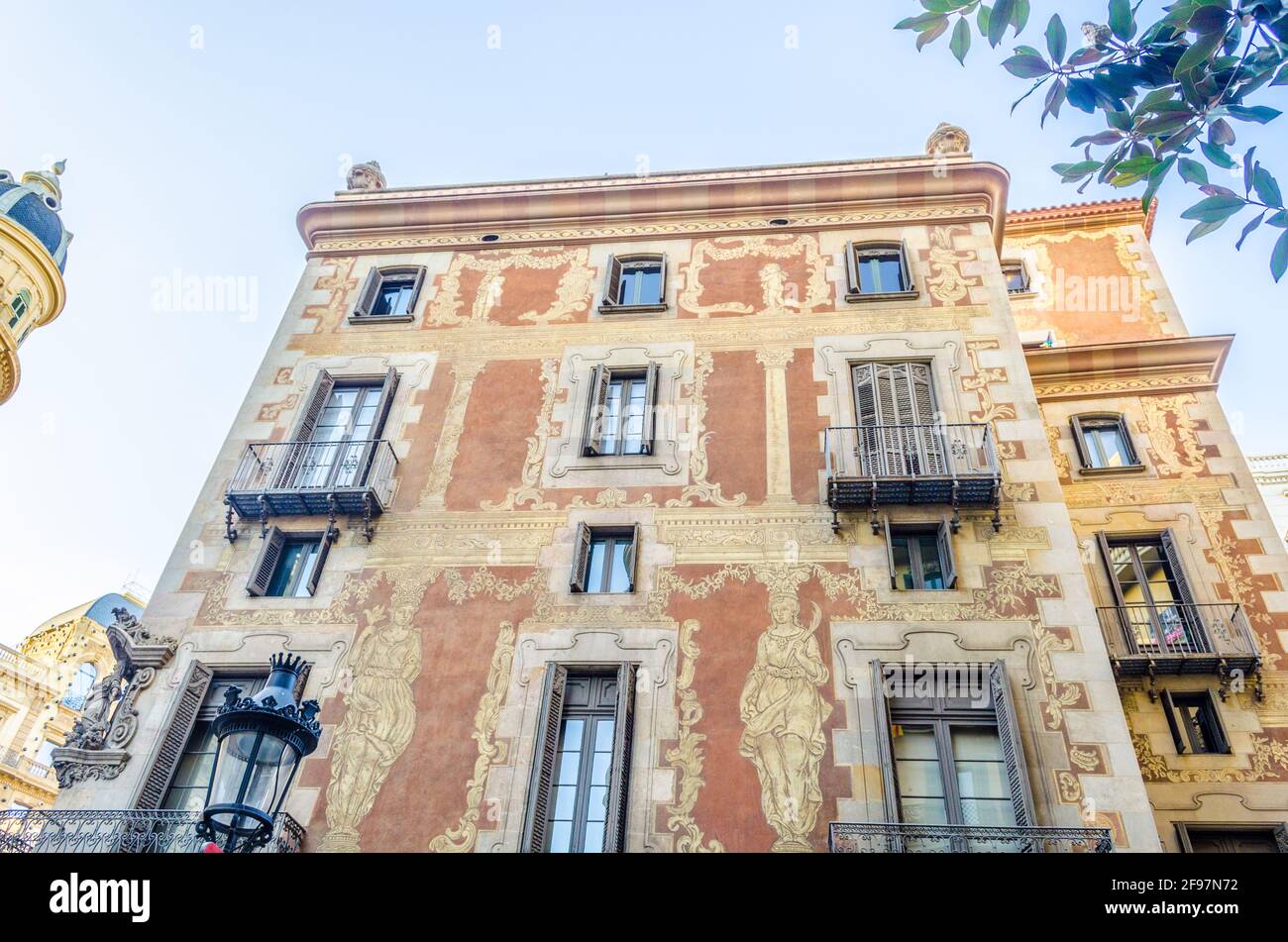 a building with beautiful facade in the historical center of Barcelona ...