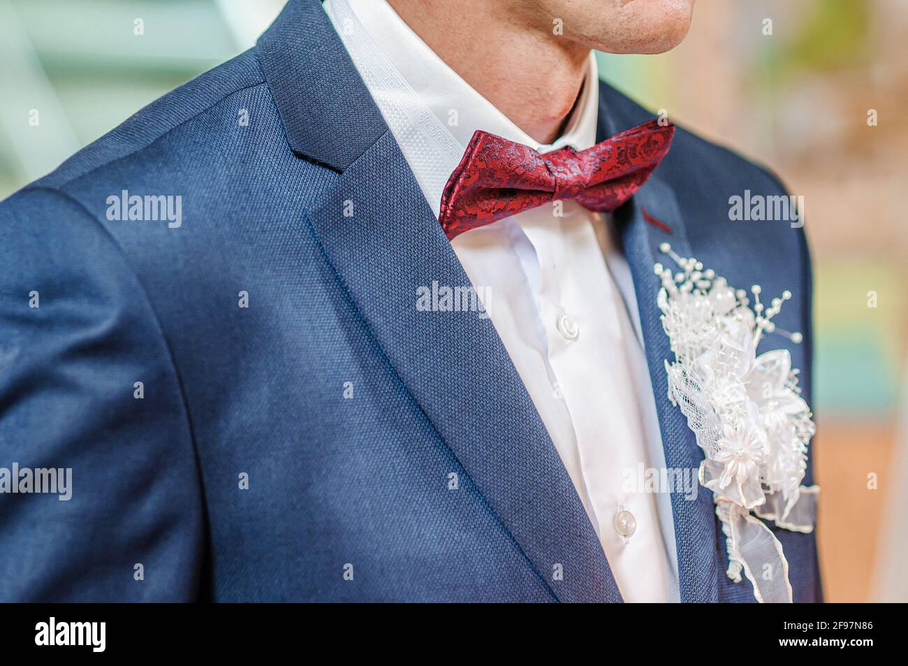 Red ribbon around neck hi-res stock photography and images - Alamy