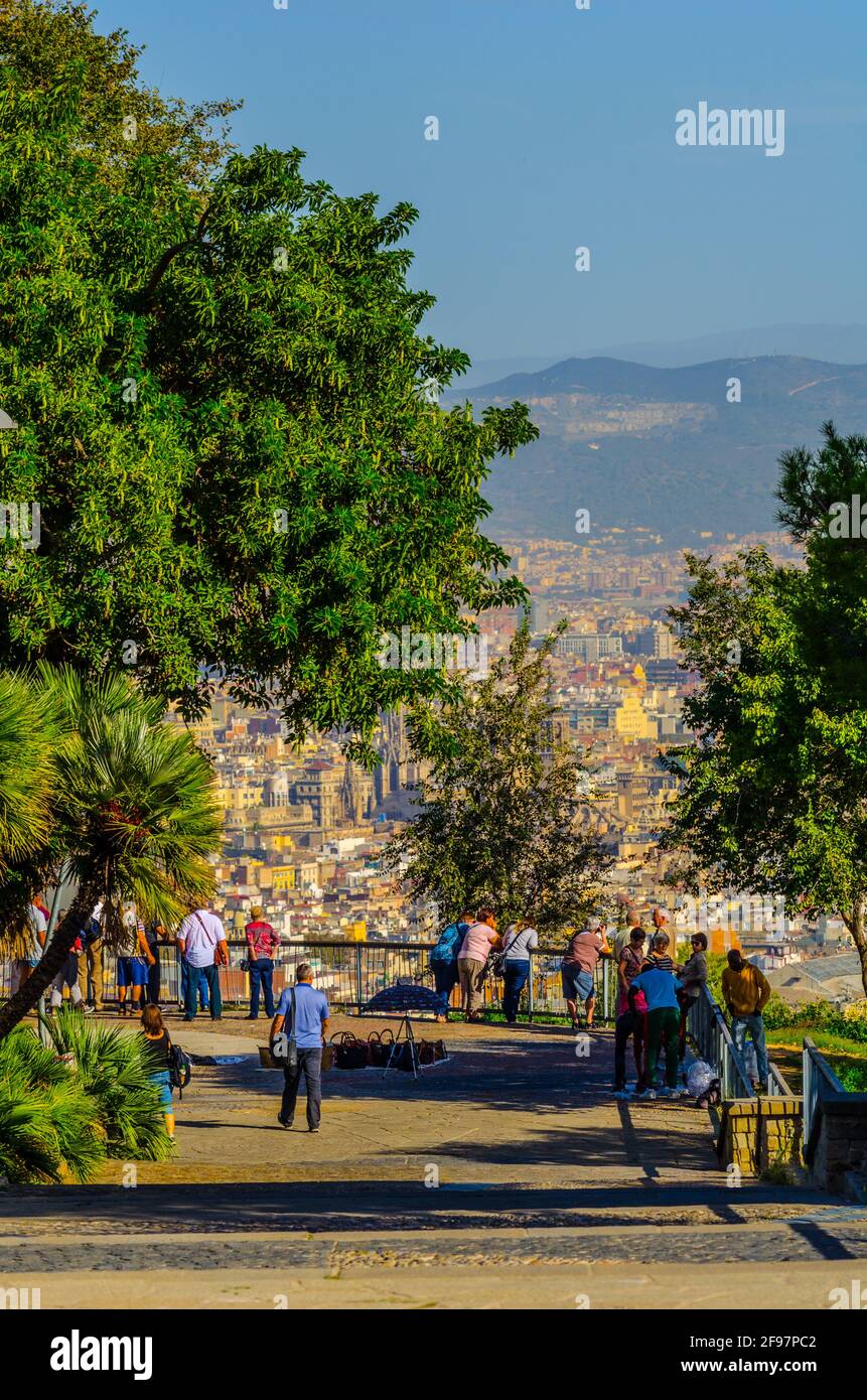 People are looking at Barcelona from a terrace next to the upper ...