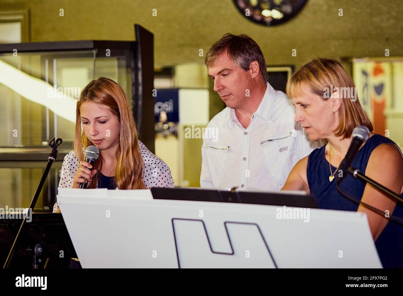 Song leaders at a family event Stock Photo - Alamy