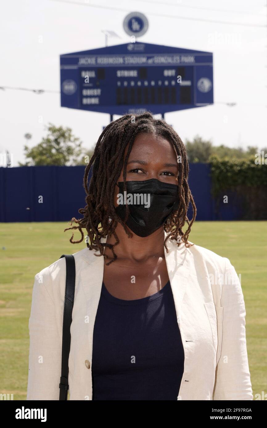Ayo Robinson poses with face mask at a Los Angeles Dodgers Foundation ...
