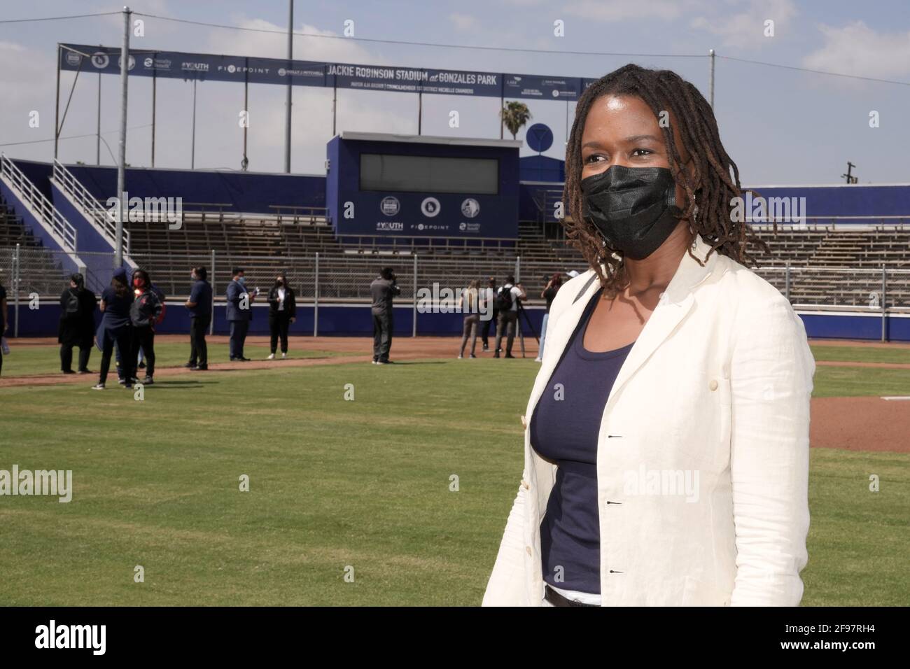 Ayo Robinson poses with face mask at a Los Angeles Dodgers Foundation ...