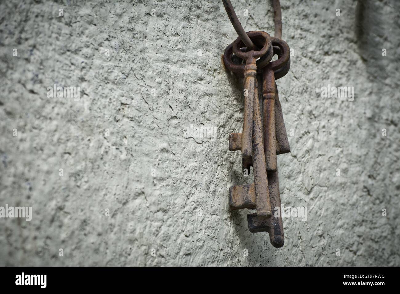 Old rusty keys hanging Stock Photo - Alamy