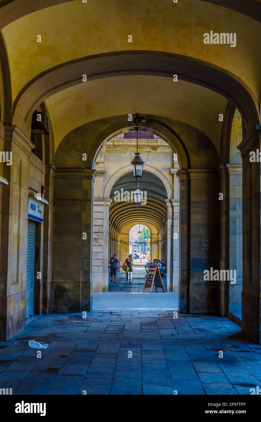View of an arcade at the Placa Reial in Barcelona, Spain Stock Photo ...