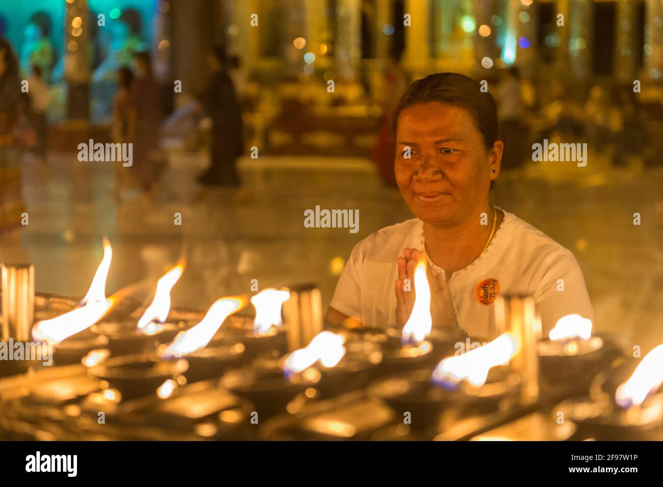 Myanmar, Yangon, the Shwedagon Pagoda, believers, candles, sea of ...