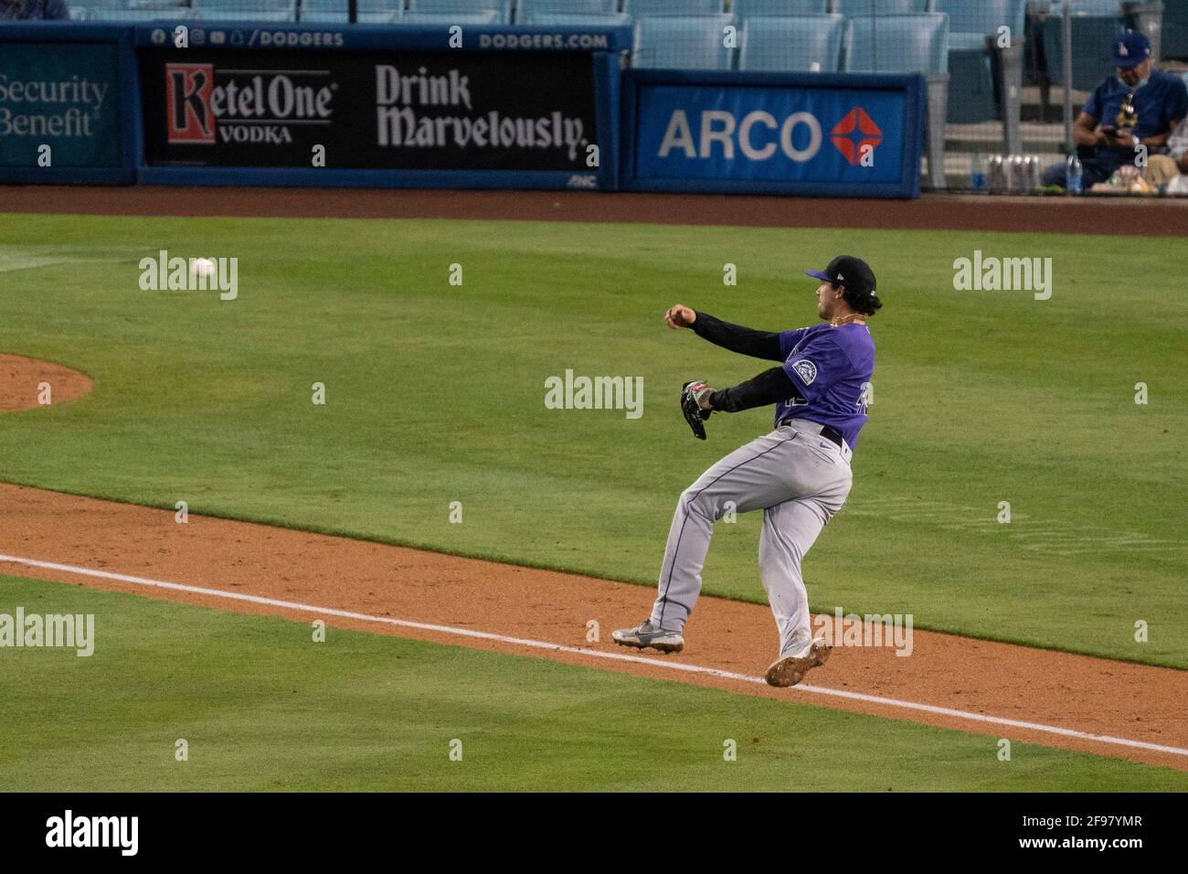 Colorado Rockies third baseman Josh Fuentes throws to first during a ...