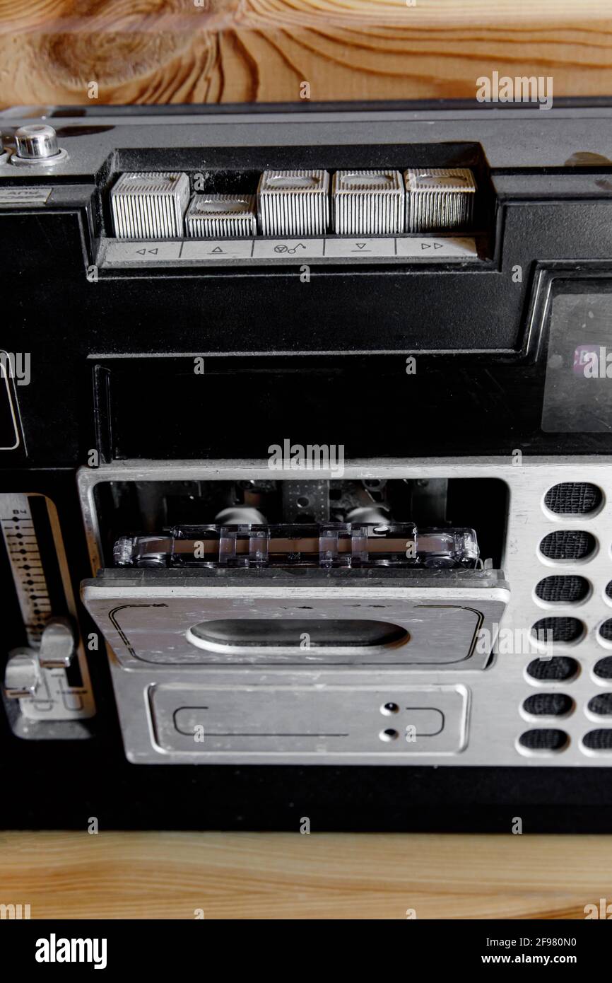 Old tape recorder with audio cassette Stock Photo - Alamy