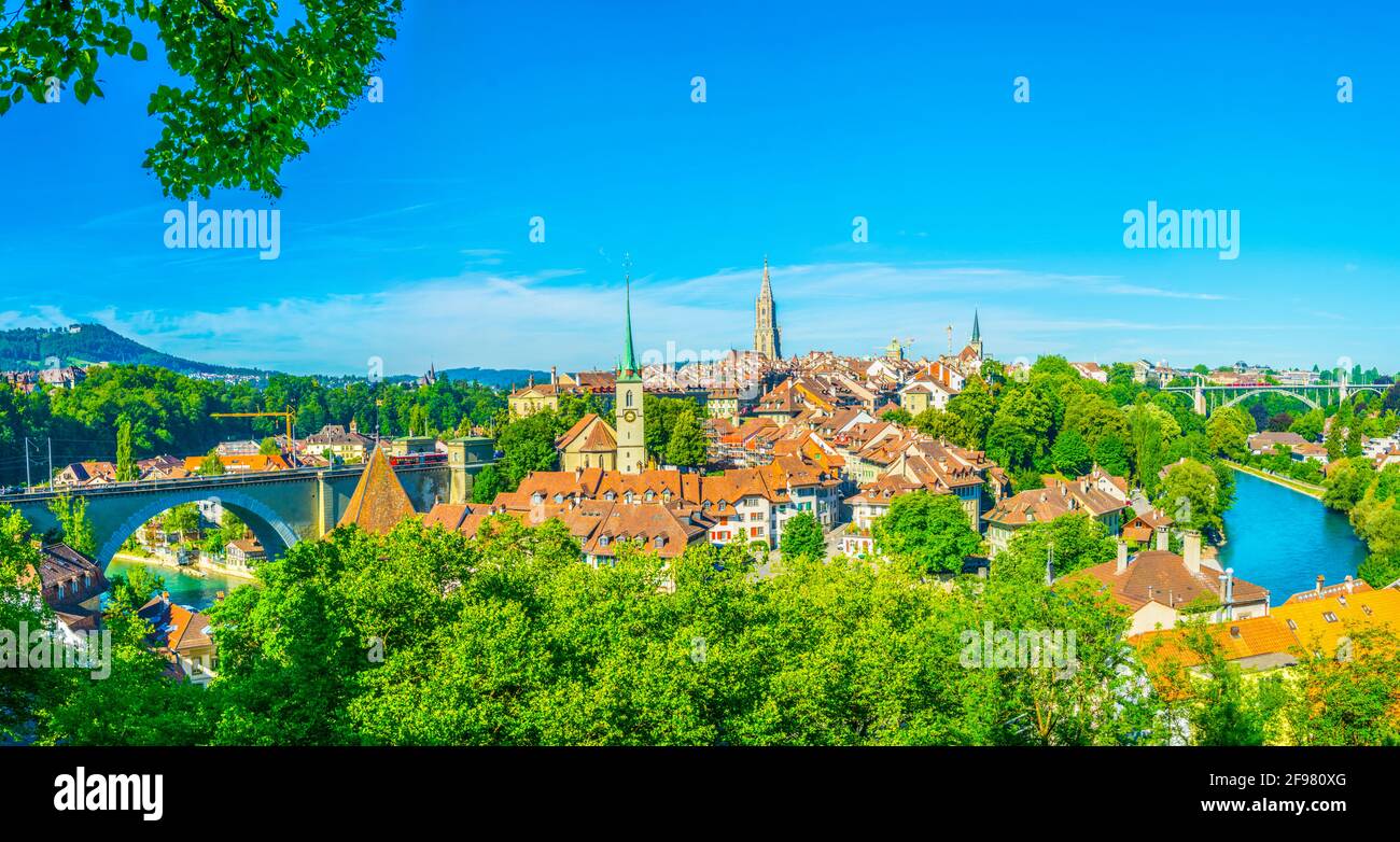 Aerial view of Bern dominated by Münster cathedral and Bundeshaus ...