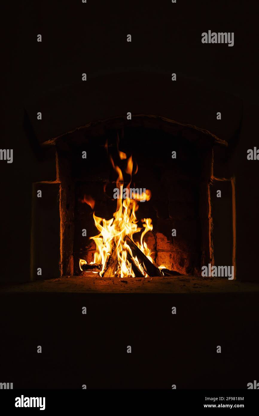 Fire flame in the fireplace Stock Photo - Alamy