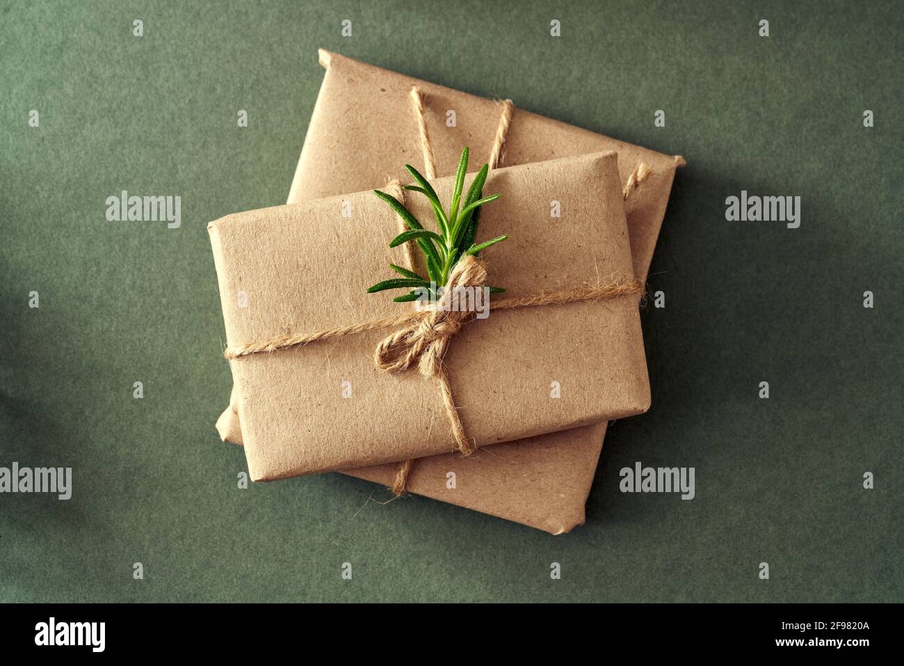 Two Christmas presents wrapped in ecological recycled paper - zero ...