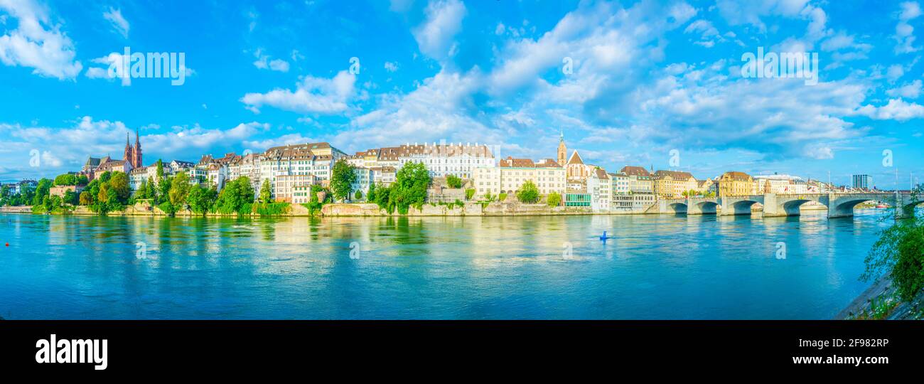 Riverside of Rhine in Basel dominated by majestic building of Munster ...