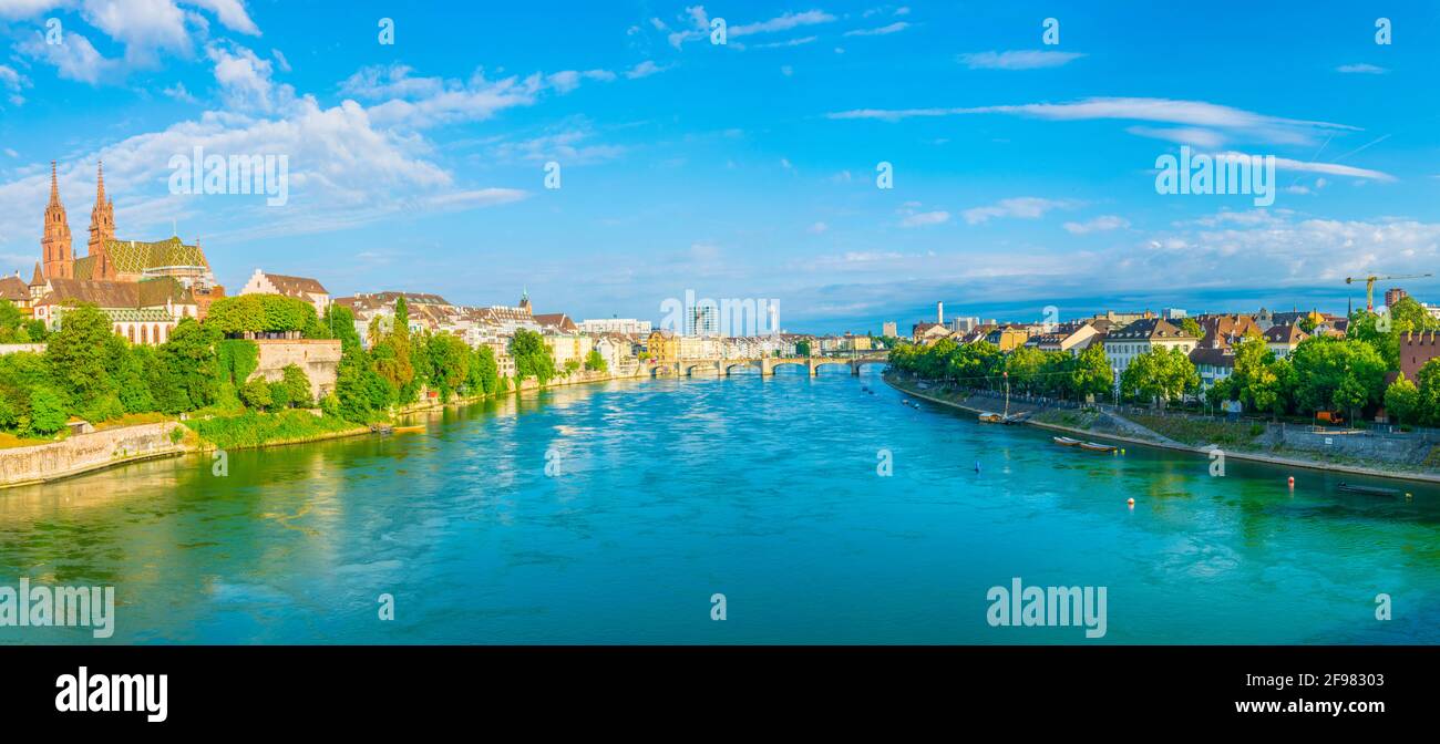 Riverside of Rhine in Basel dominated by majestic building of Munster ...
