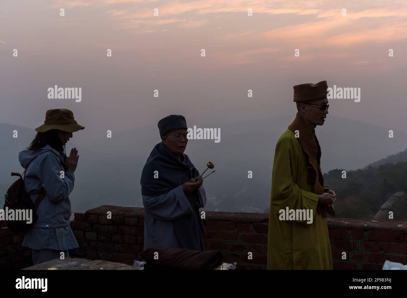 India, Rajagriha, Vulture Peak, monks, believers, prayer Stock Photo ...