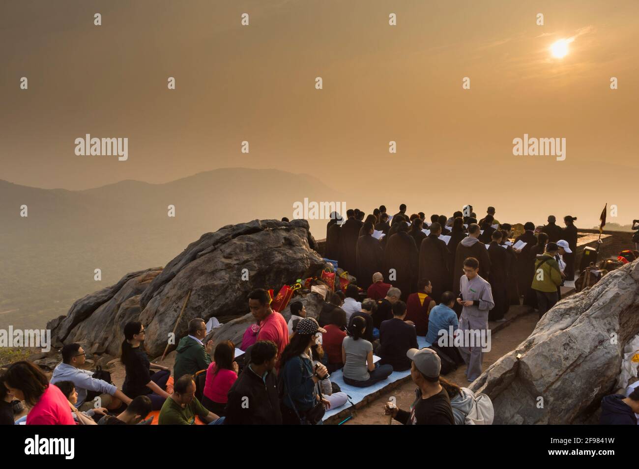 India, Rajagriha, Vulture Peak, monks, believers, prayer Stock Photo ...