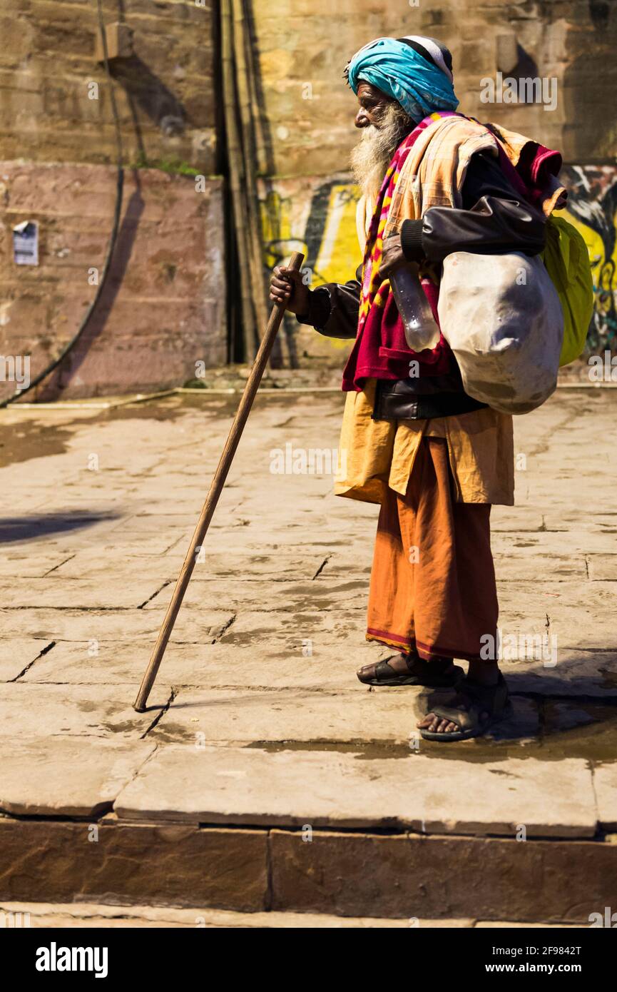India, Varanasi, scenes at Dasaswamedh Ghat, beggars, stick Stock Photo ...
