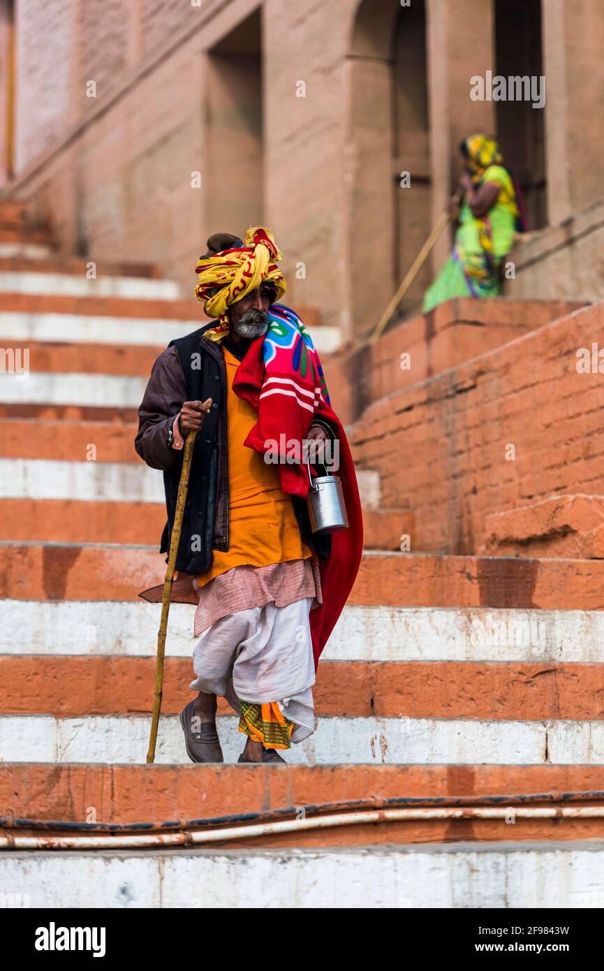 India, Varanasi, scenes at Dasaswamedh Ghat, beggars, stick Stock Photo ...