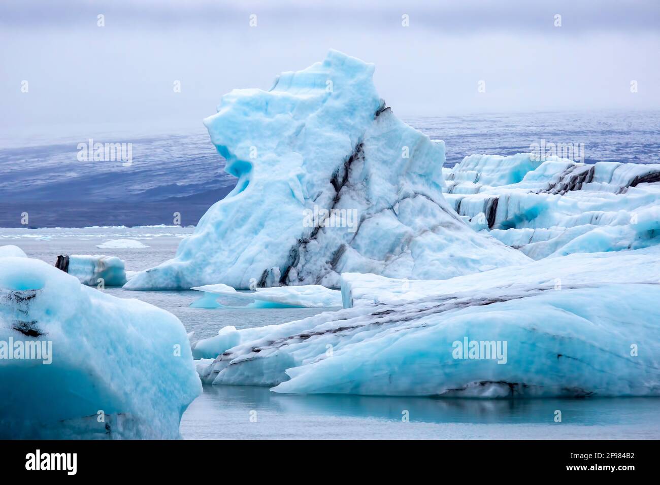 Blue Ice on the shore of the ice lagoon in Iceland Stock Photo - Alamy