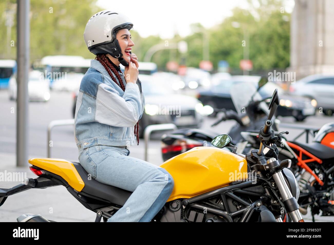 Woman riding a motorcycle hi-res stock photography and images - Alamy
