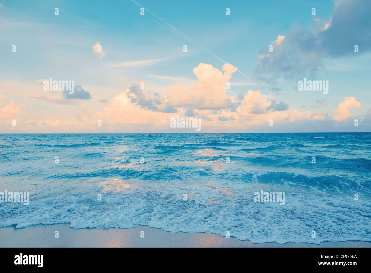 Blue ocean water on beach at sunset. Natural sea water background Stock ...