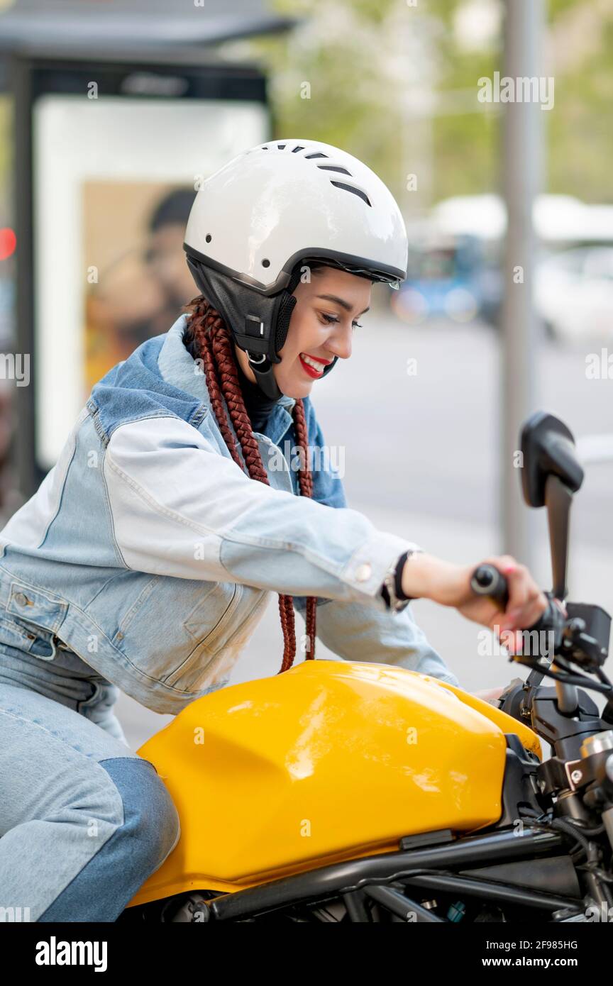 Woman riding a motorcycle hi-res stock photography and images - Alamy
