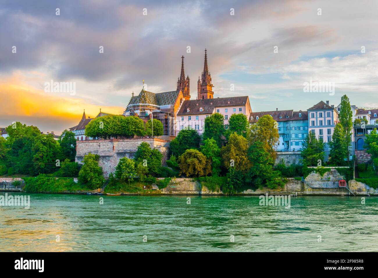 Sunset view of riverside of Rhine in Basel dominated by majestic ...