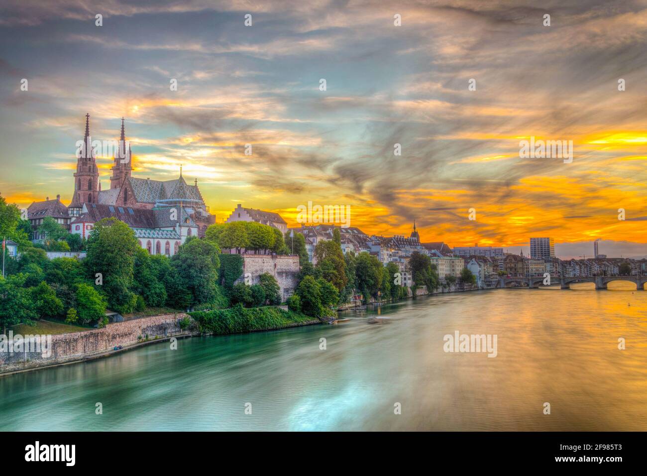 Sunset view of riverside of Rhine in Basel dominated by majestic ...