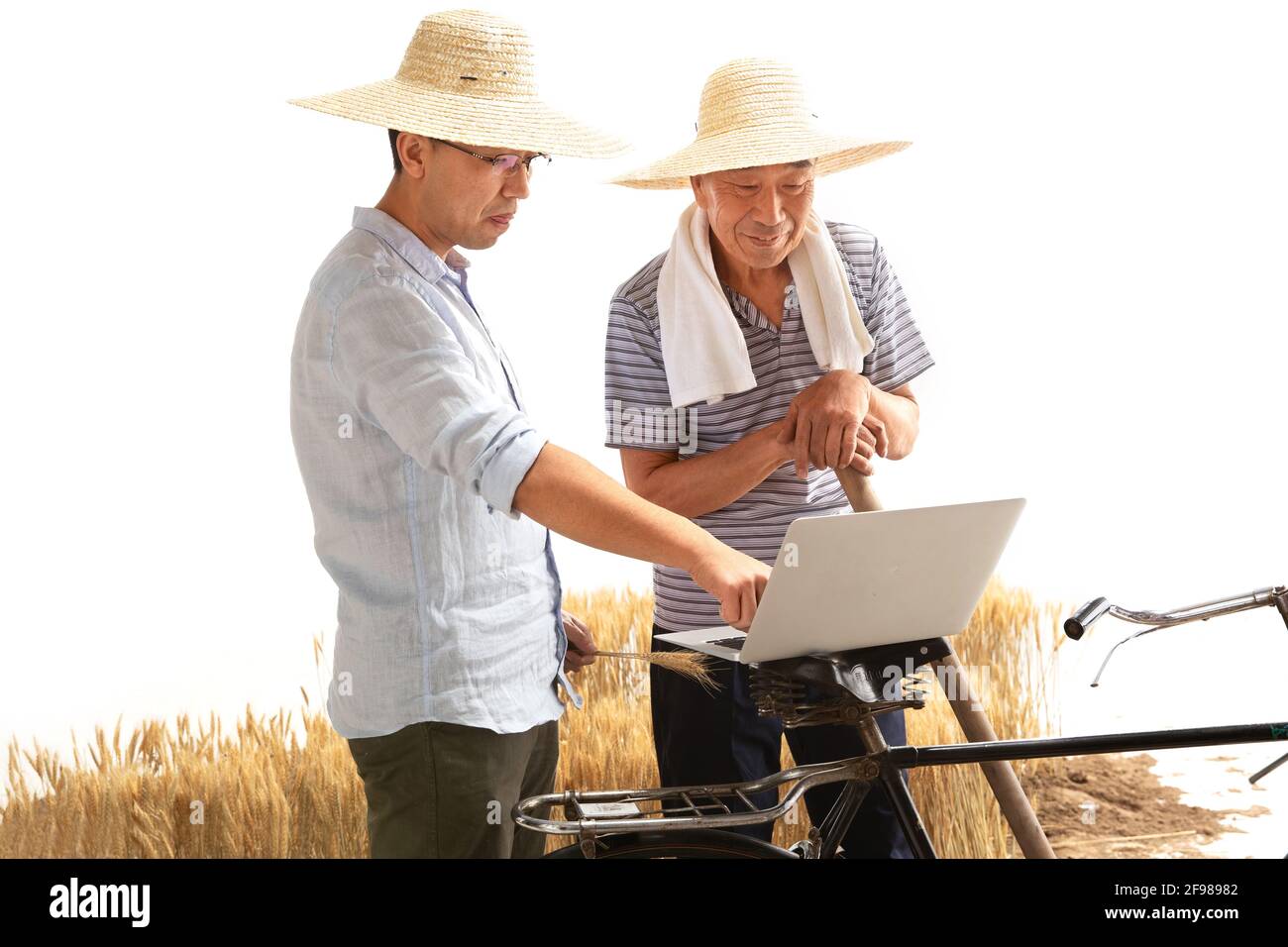 Communication technology researchers and farmers Stock Photo - Alamy