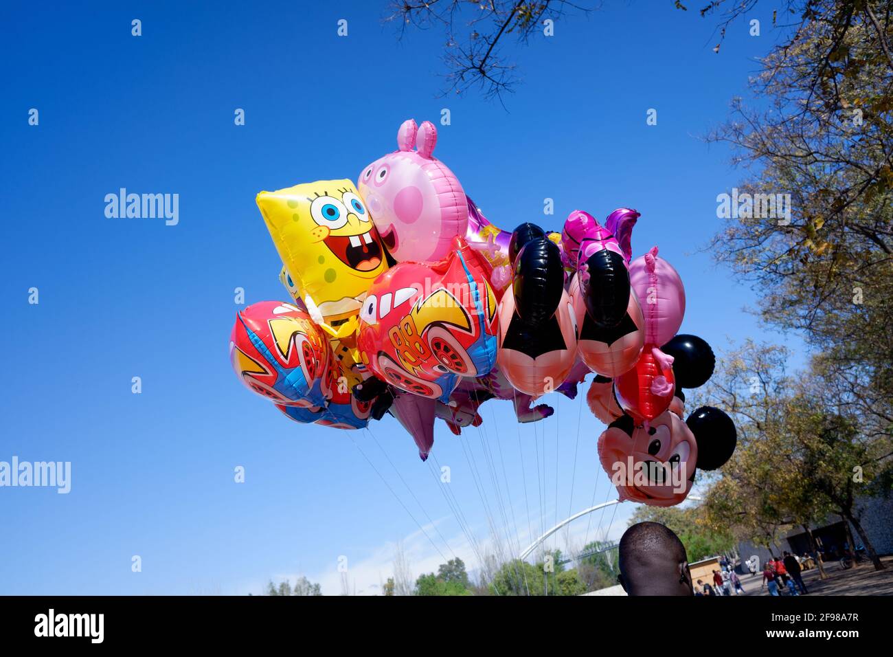 Helium cartoon characters balloons hi-res stock photography and images ...