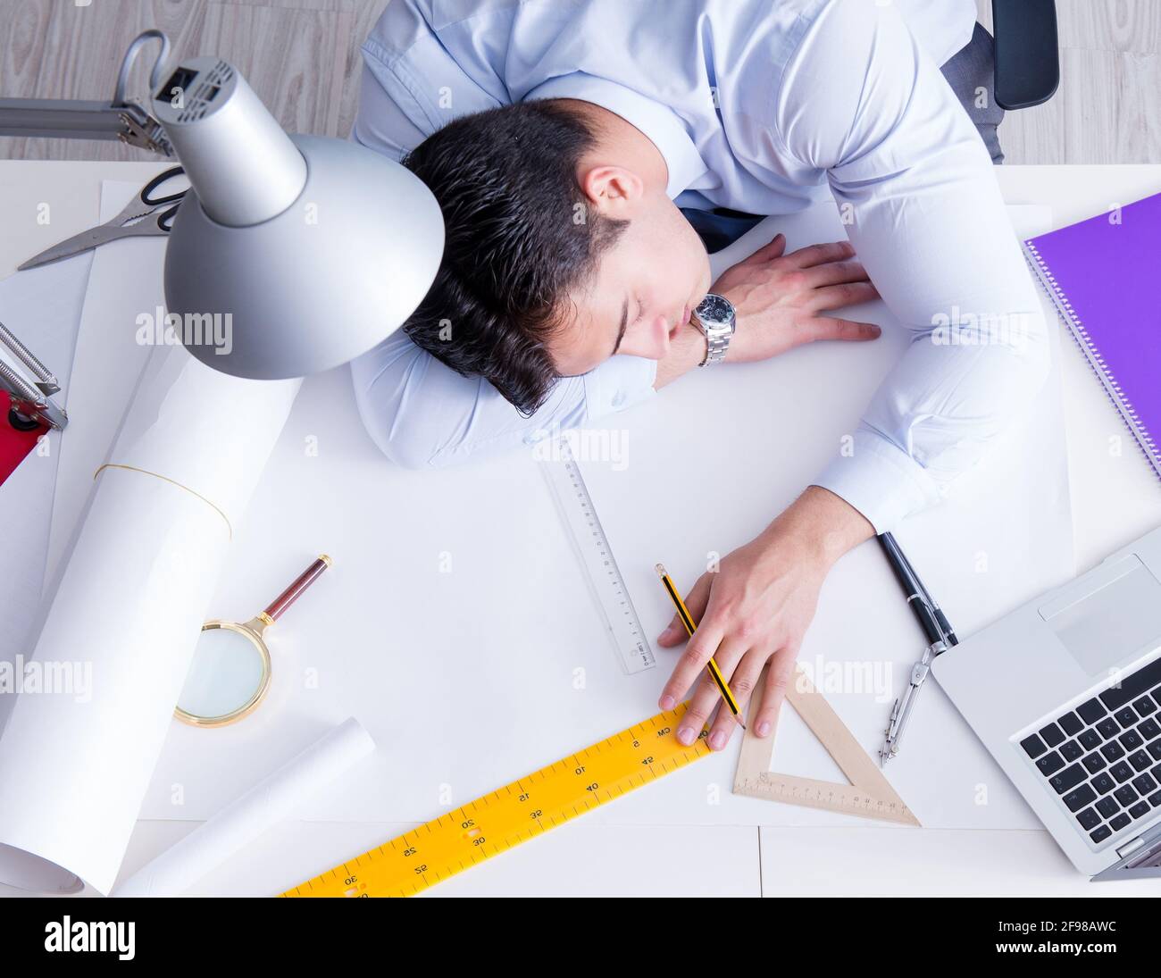 The engineer working on new project drawings Stock Photo - Alamy
