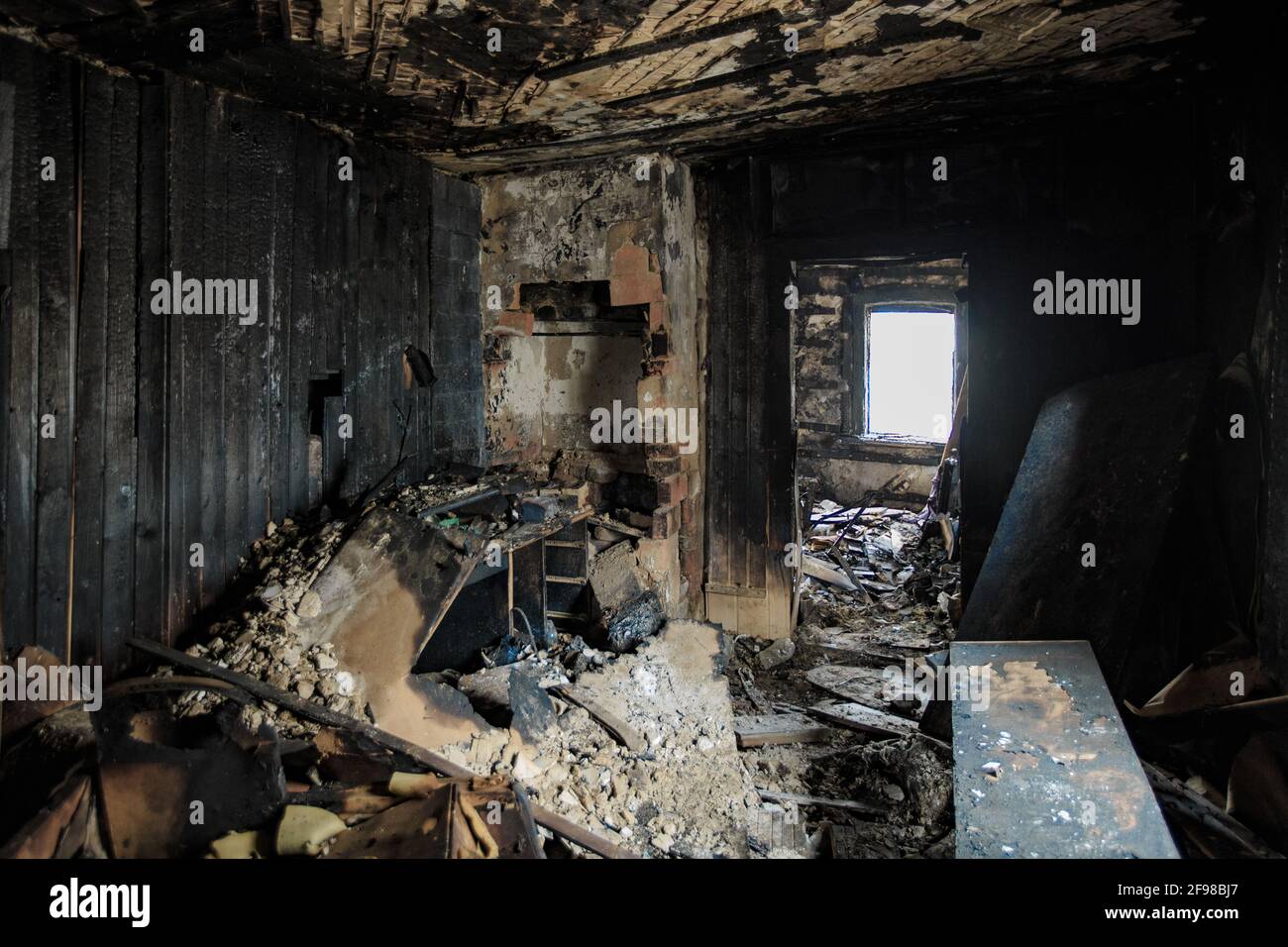 Burnt wooden house interior. Consequences of fire Stock Photo - Alamy