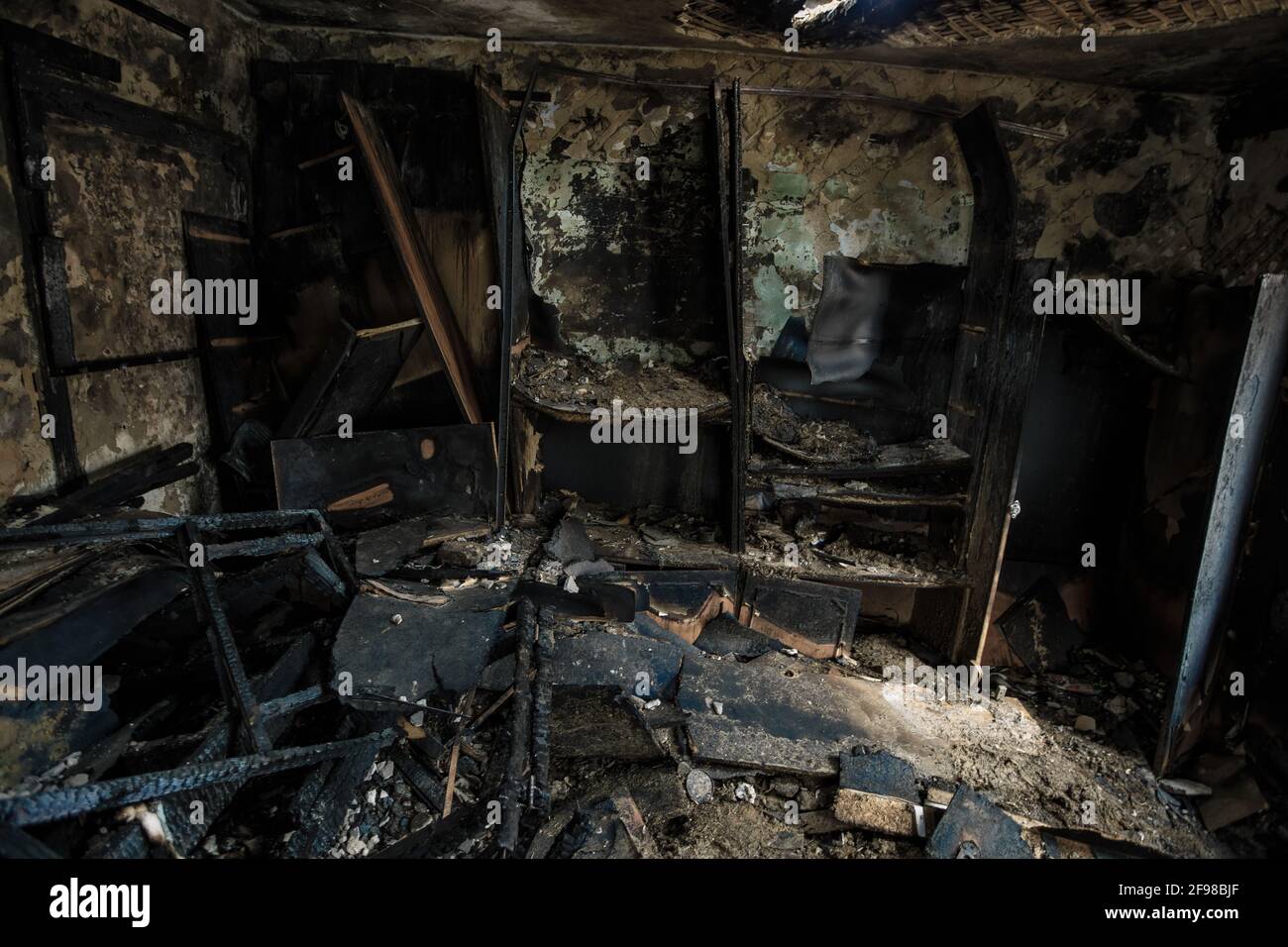 Burnt wooden house interior. Consequences of fire Stock Photo - Alamy