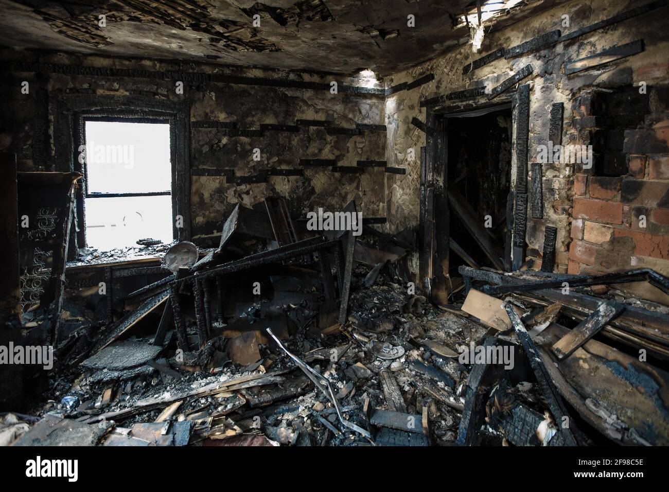 Burnt old house interior. Consequences of fire Stock Photo - Alamy