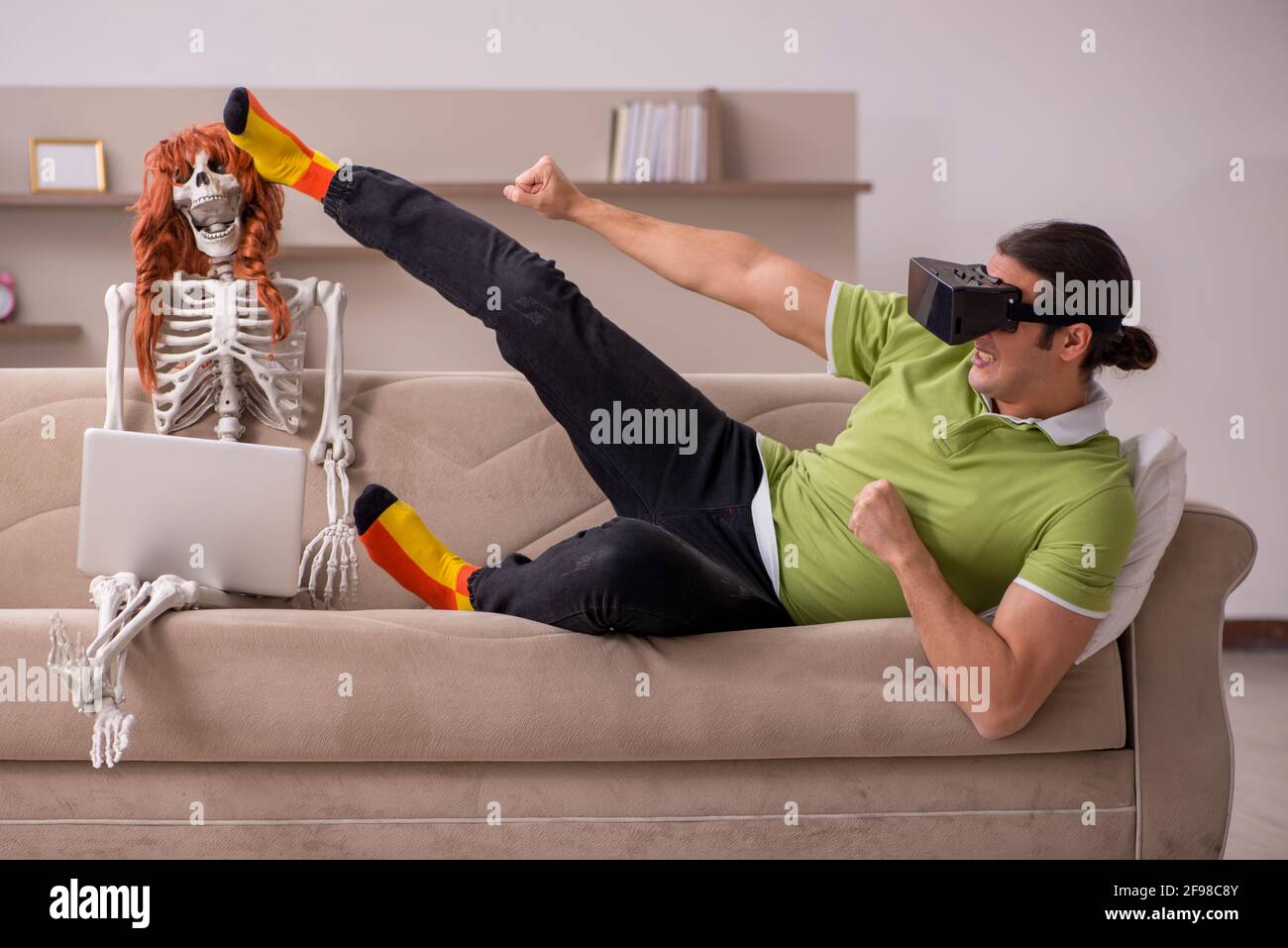 Man with female skeleton in virtual reality concept Stock Photo - Alamy