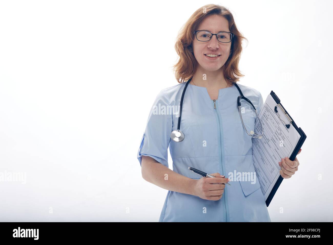 Doctor woman standing isolated on white background Stock Photo - Alamy